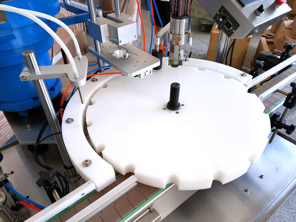 Automatic carousel filling capping machine